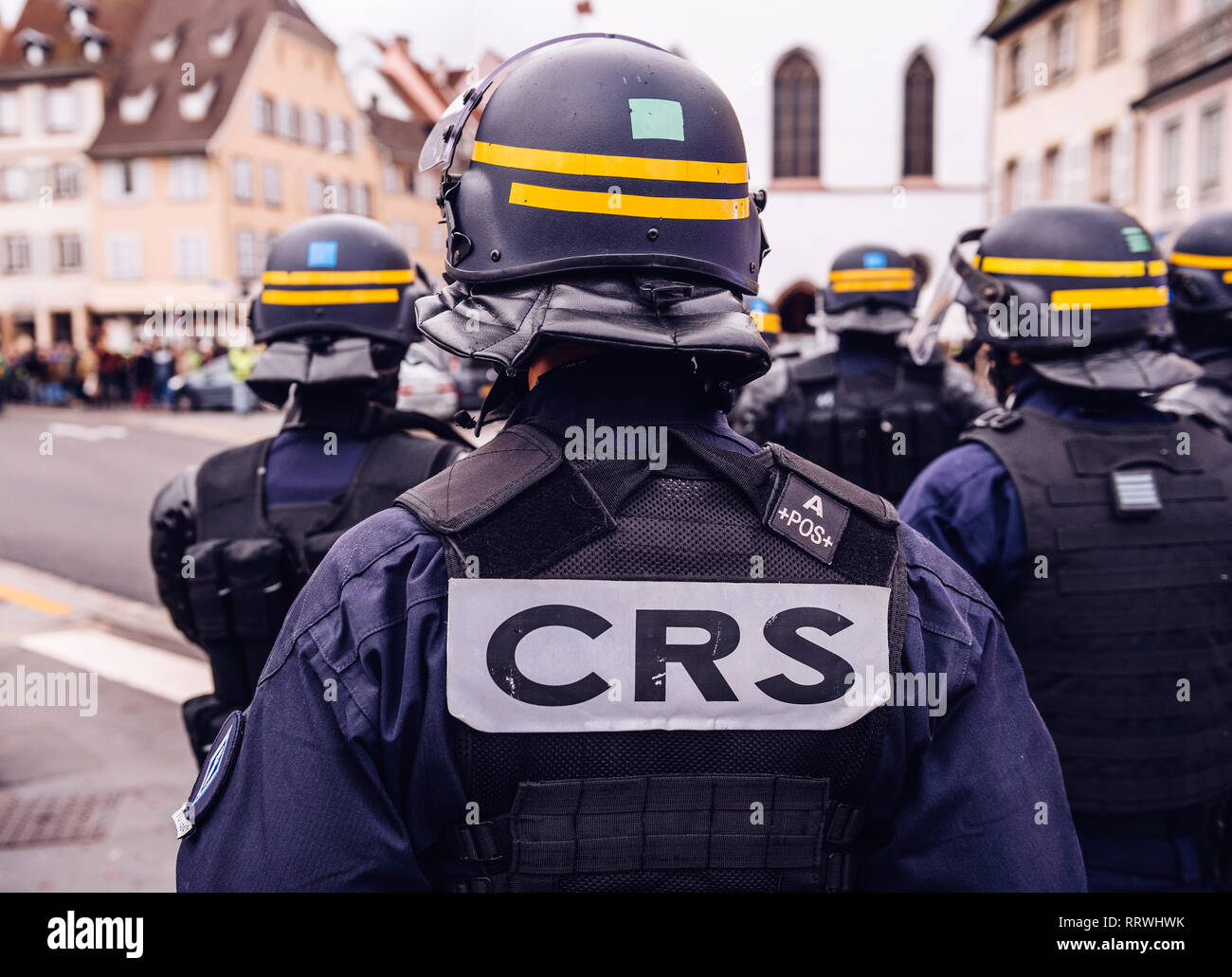 CRS police officers securing the zone in frong of the Yellow vests ...