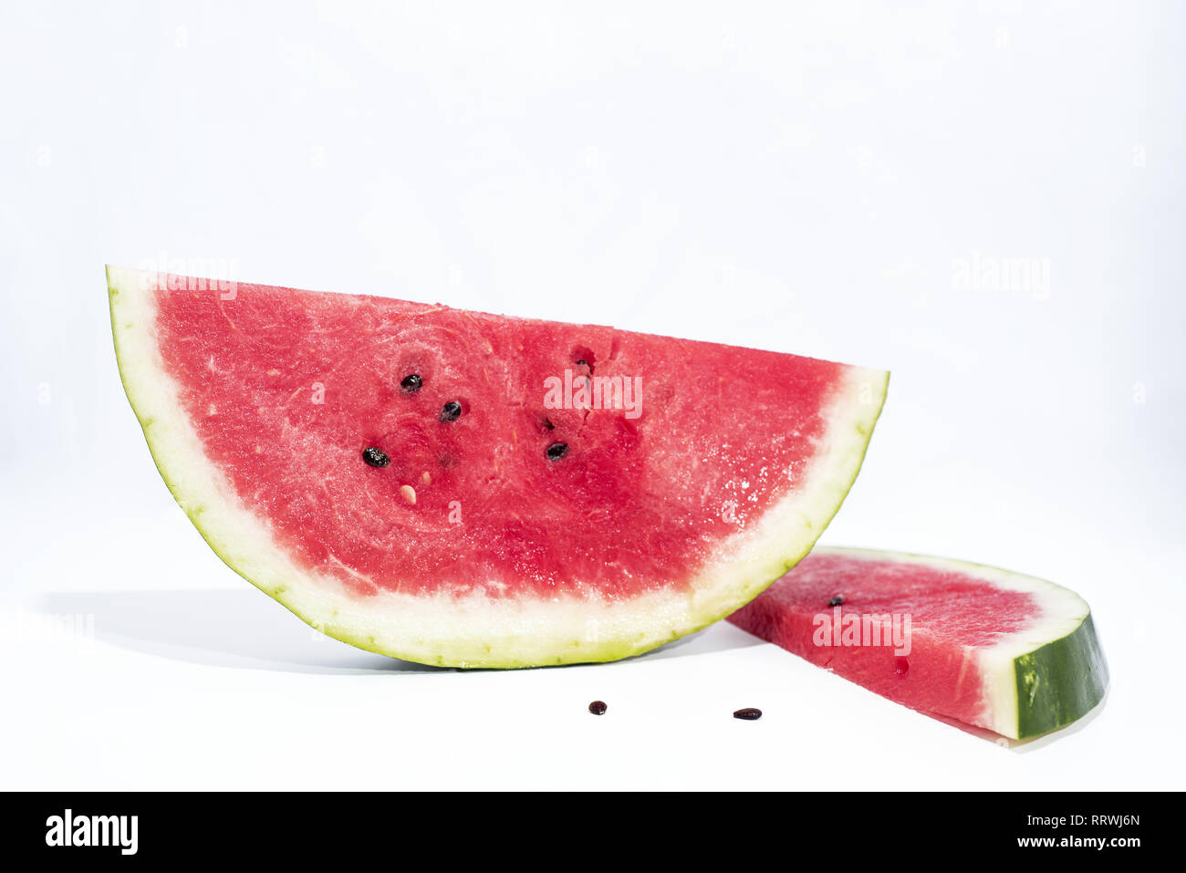 Sliced of watermelon isolated on white background Stock Photo - Alamy