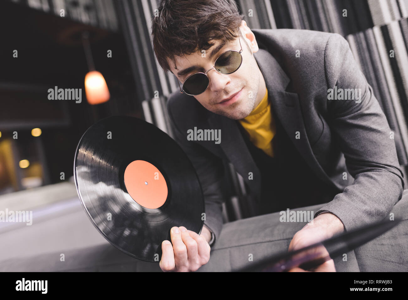Man looking at records hi-res stock photography and images - Alamy