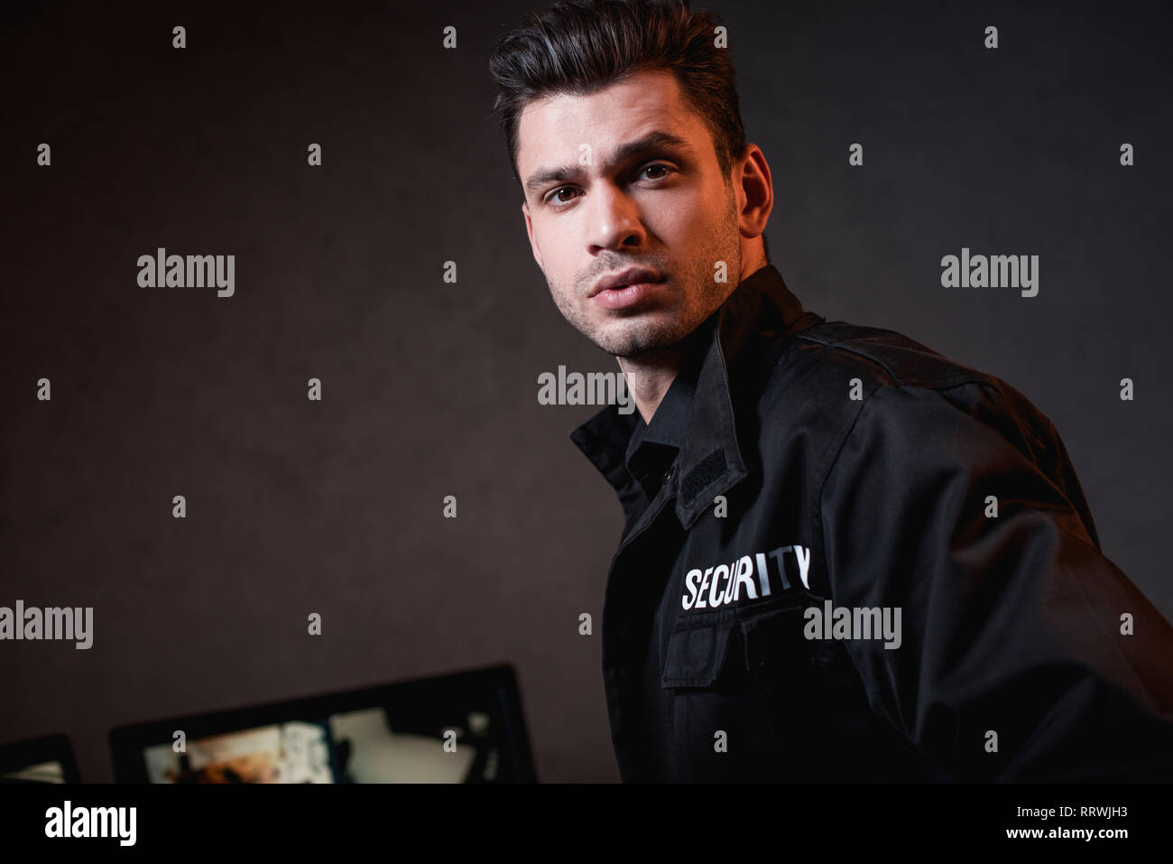 Male guard in black hi-res stock photography and images - Alamy