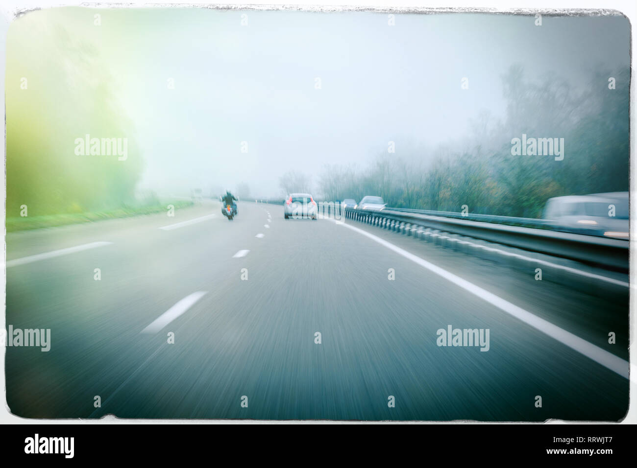 Vintage frame effect over German autobahn highway blurred motion with ...