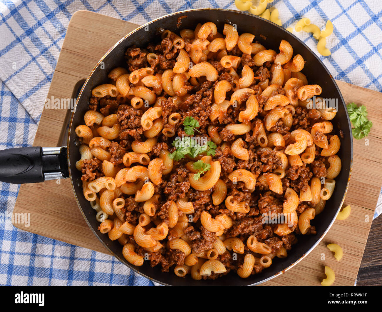 Top view. Makaroni po flotski russian national dish. Pasta with ground ...