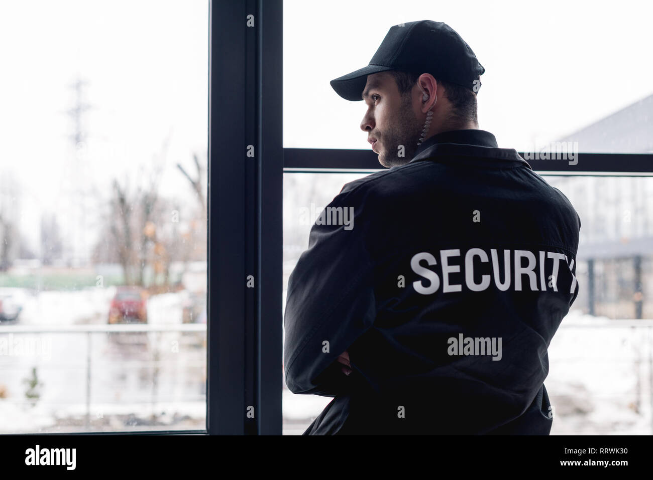 Security guard male back view hi-res stock photography and images - Alamy
