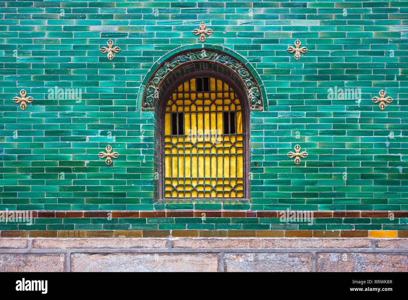 Yellow Chinese Traditional Window With A Metal Frame And Green Blue ...