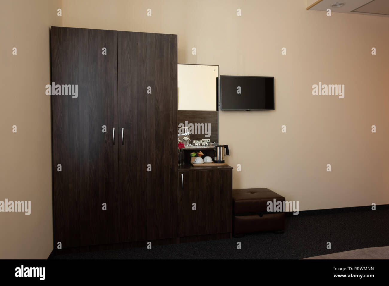 hotel room interior with wardrobe and mirror Stock Photo - Alamy