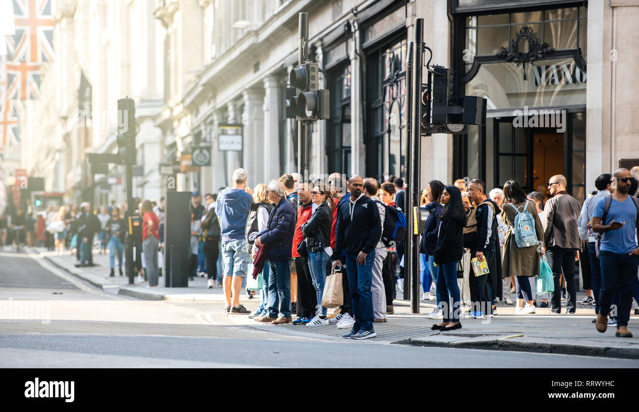 LONDON, UNITED KINGDOM - MAY 18, 2018: Pedestrians waiting to cross the ...