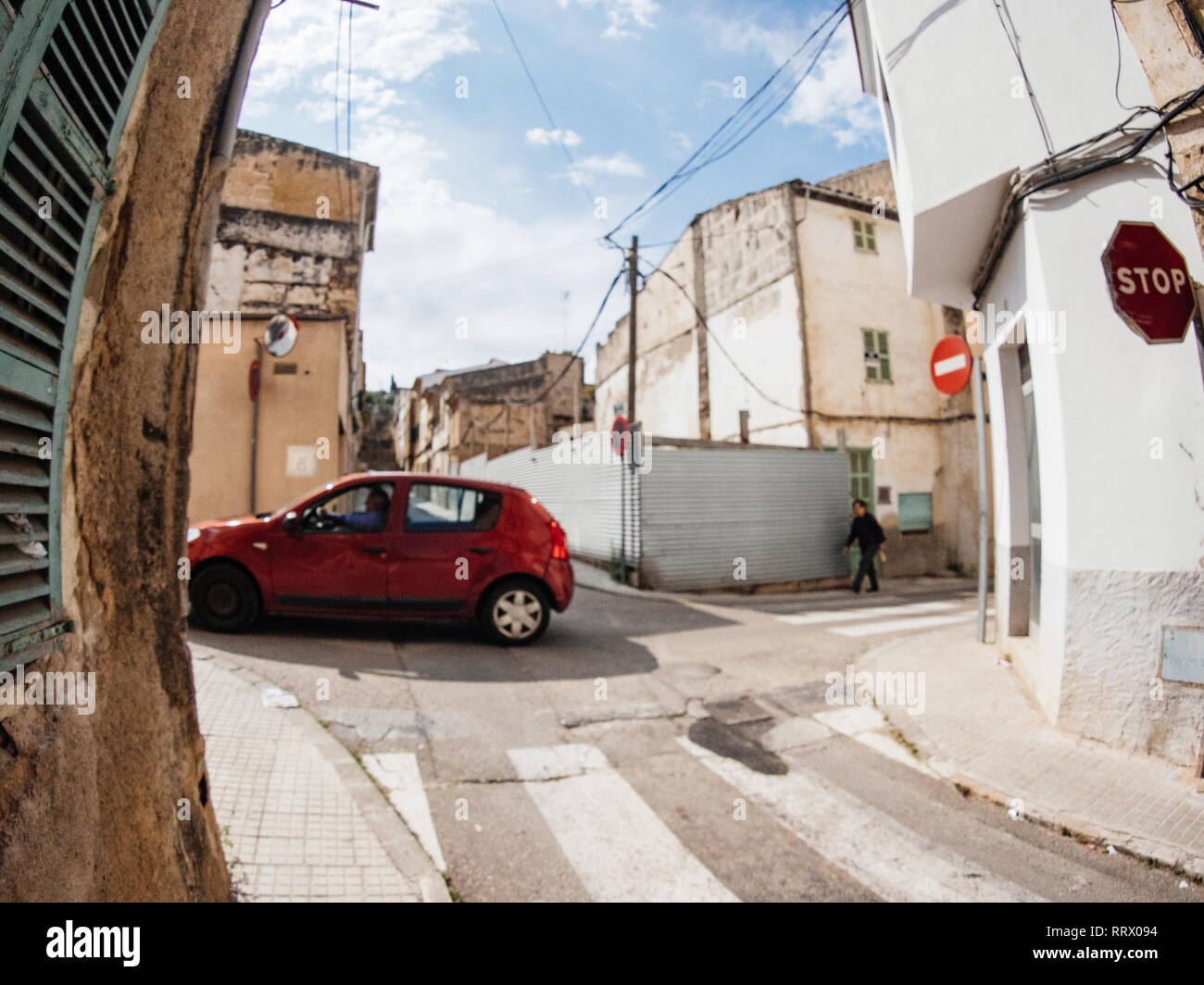Defocused view of typical street in Felanitx, majorca with car and ...