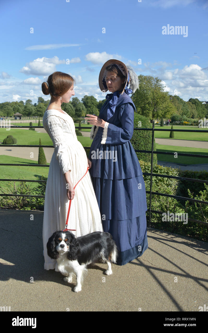 Two modern day women in historically accurate Victorian dress walk ...