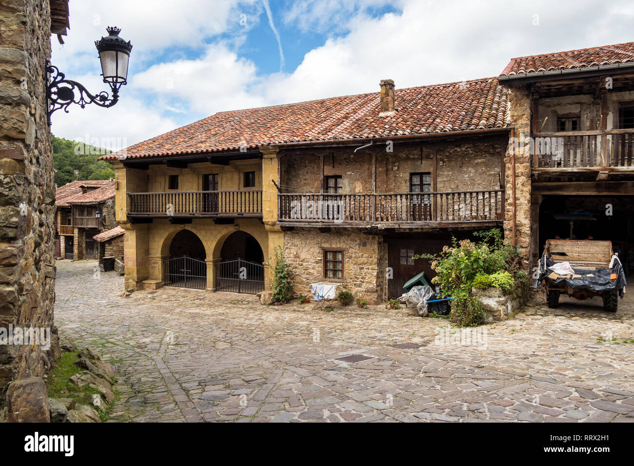 Barcena Mayor, Cabuerniga valley, with typical stone houses is one of ...