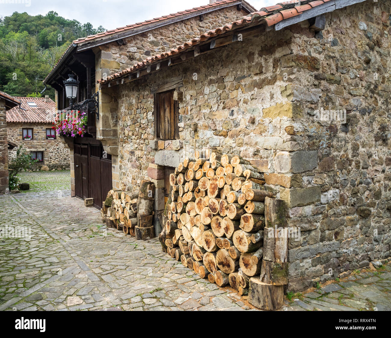 Barcena Mayor, Cabuerniga valley, with typical stone houses is one of ...