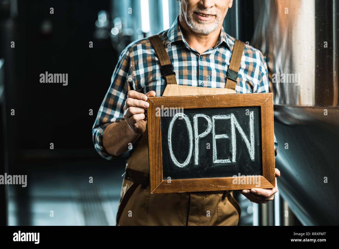 Successful owner hi-res stock photography and images - Alamy