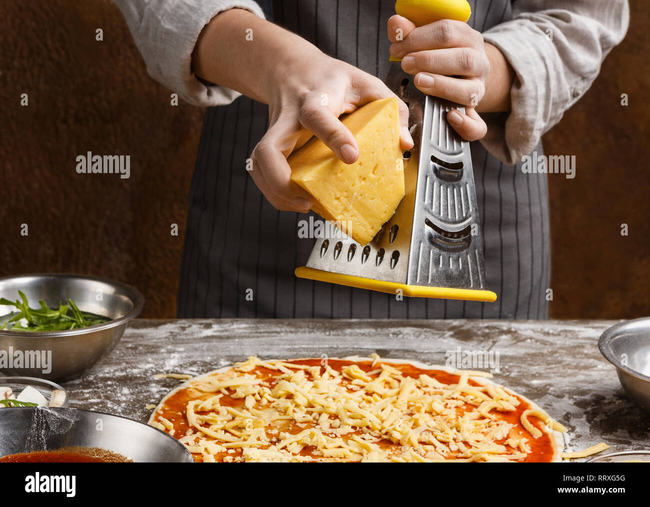 Grating cheese pizza hi-res stock photography and images - Alamy
