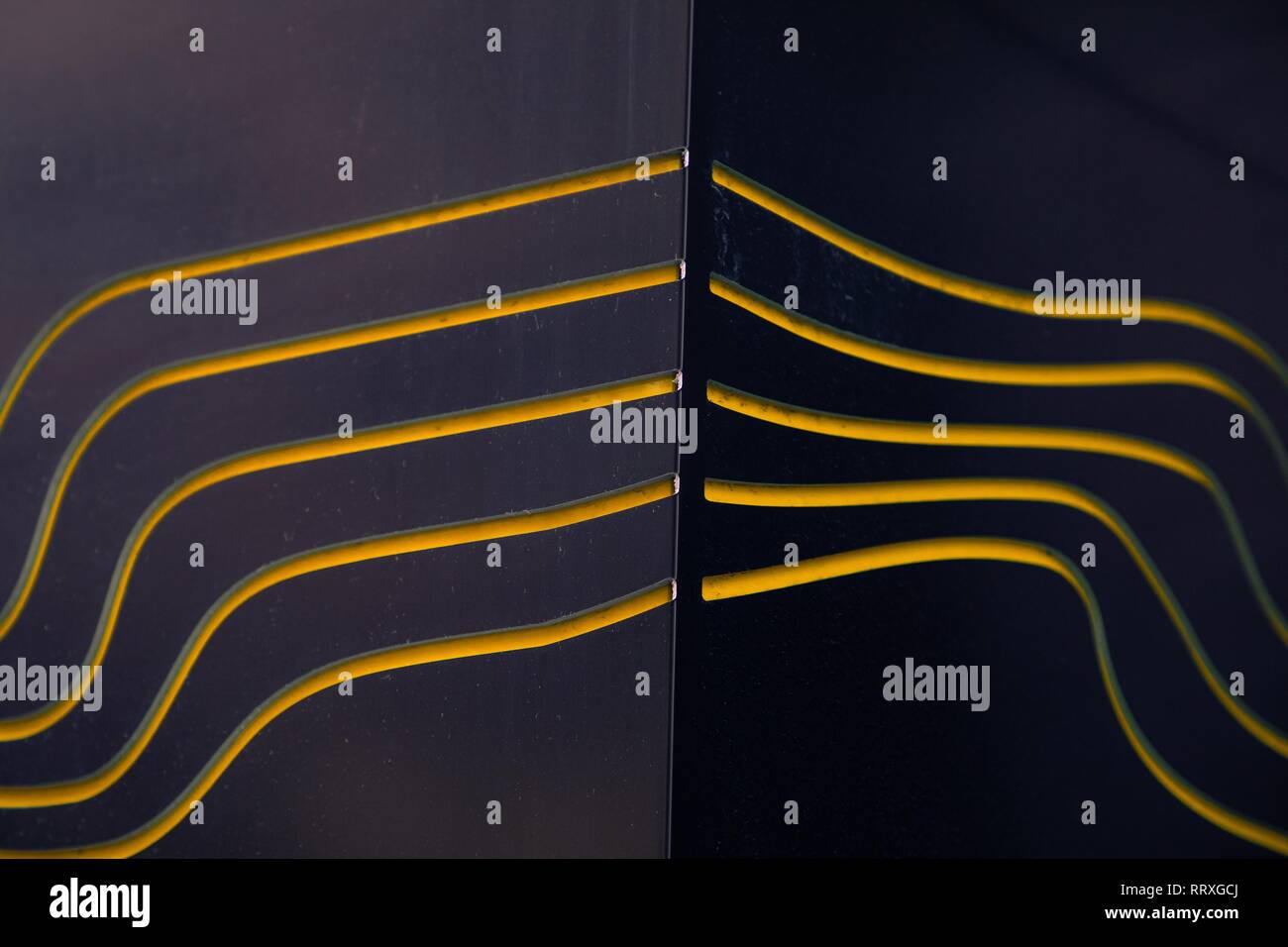 Yellow pipe lines background Stock Photo - Alamy