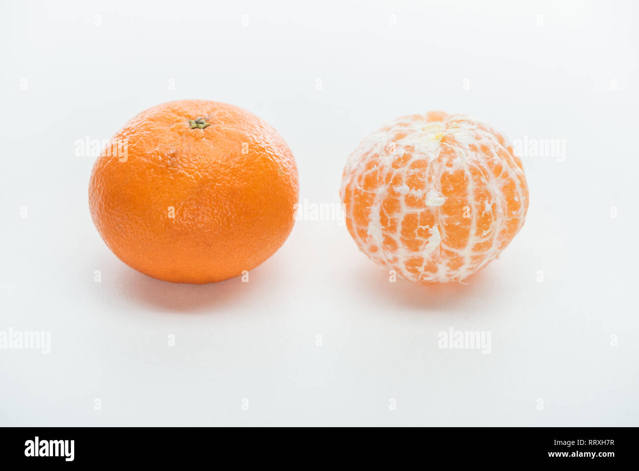 Peeled and unpeeled orange hi-res stock photography and images - Alamy