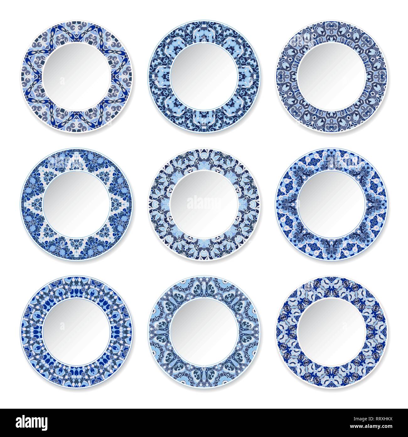 Set of decorative plates with a circular blue pattern, top view. White ...