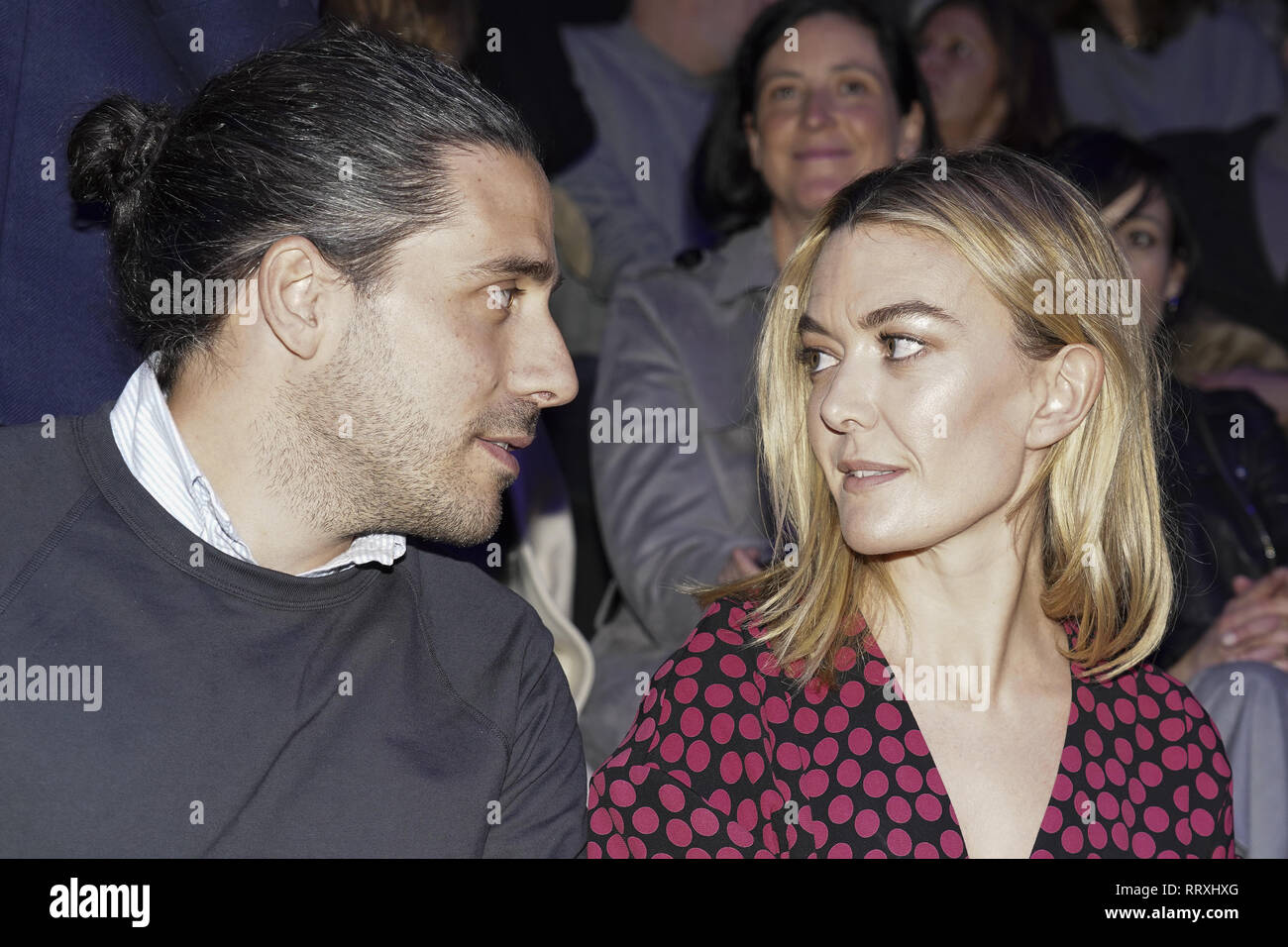 Marta Ortega and Carlos Torretta sit front row during the Roberto ...