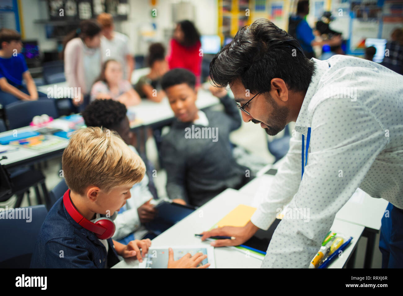 High school student and teacher talking hi-res stock photography and ...