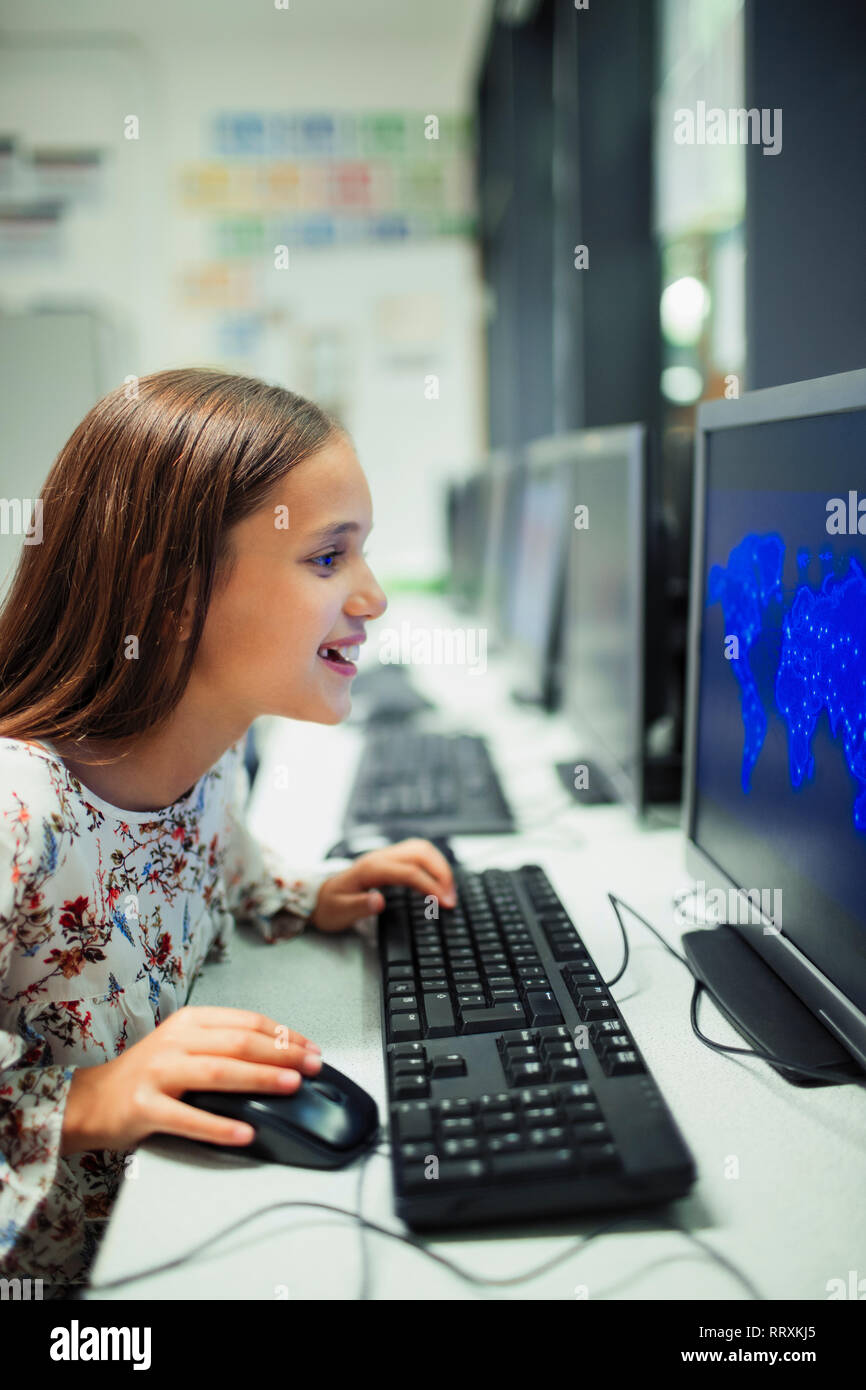 Junior high school girl student using computer in classroom Stock Photo ...