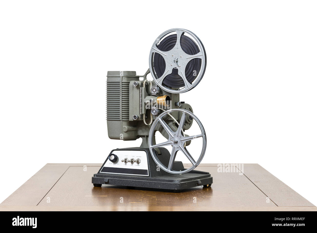 Antique 8mm home movie projector on wood table isolated on white Stock ...
