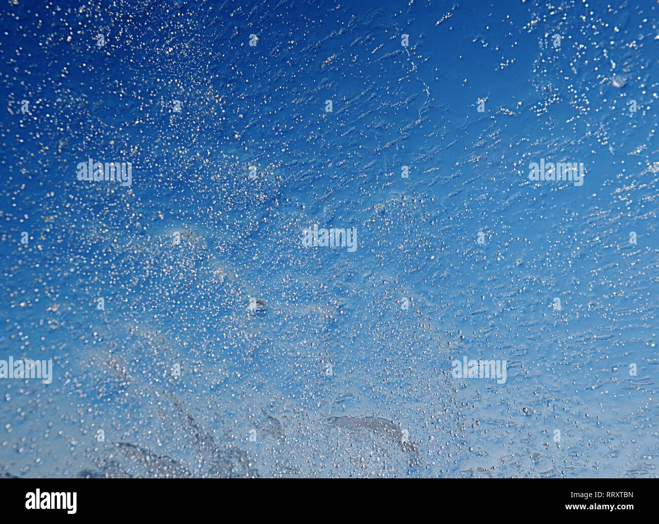 Ice board with cracks and bubbles. Natural flat ice piece Stock Photo ...