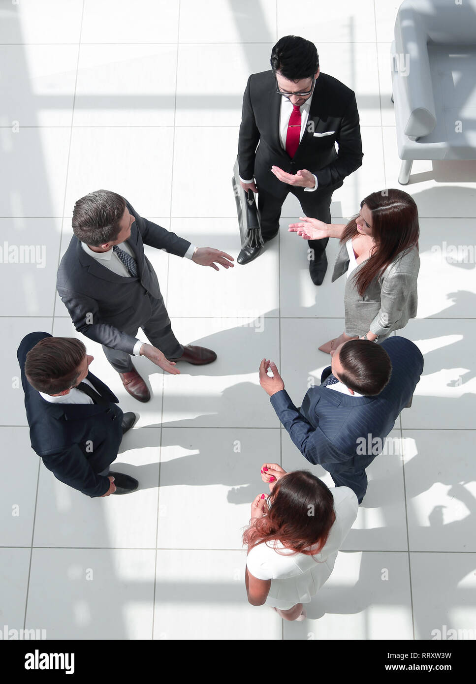 top view.a group of business people talking standing in the hall Stock ...