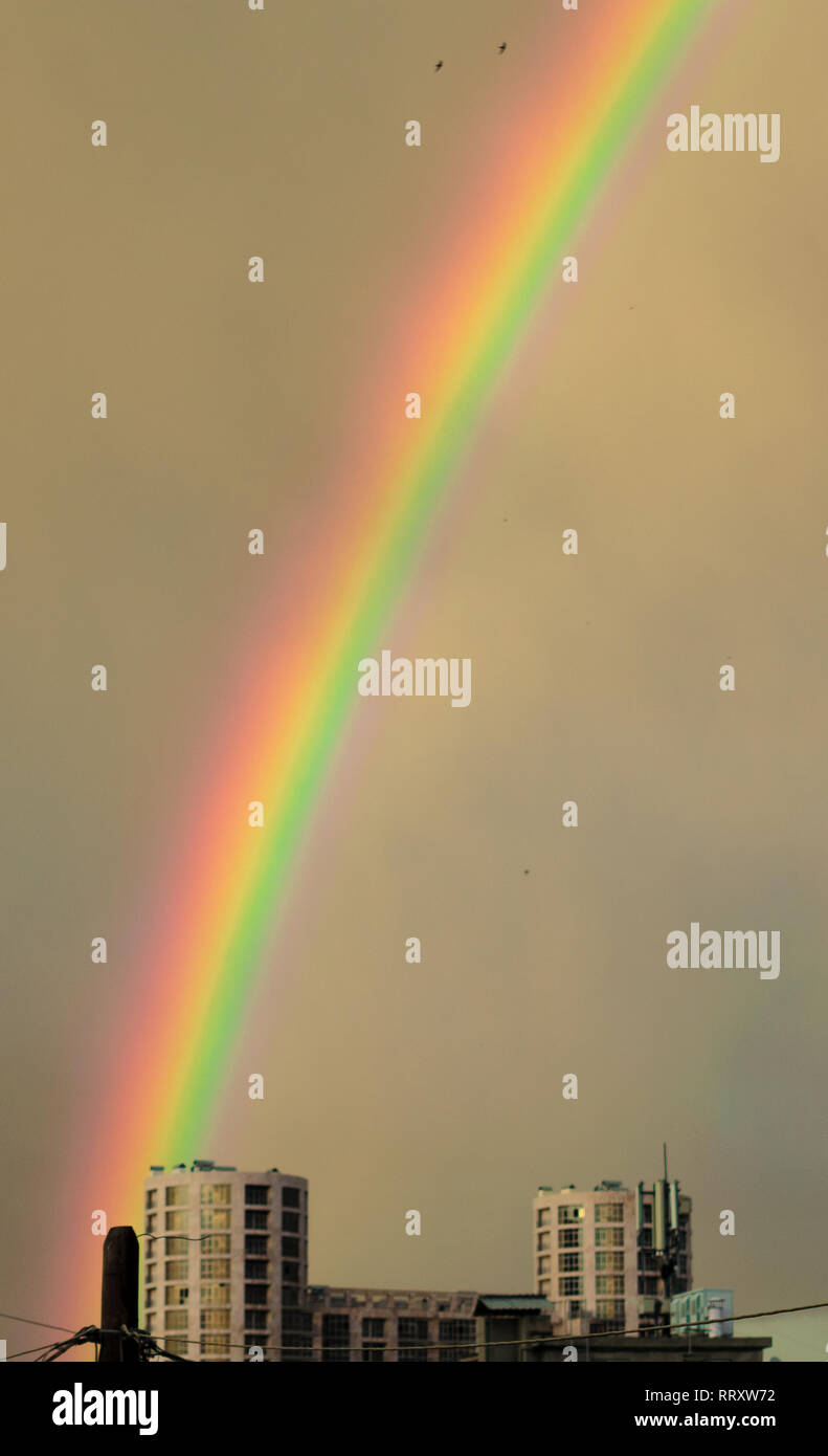 Rainbow and a building Stock Photo - Alamy