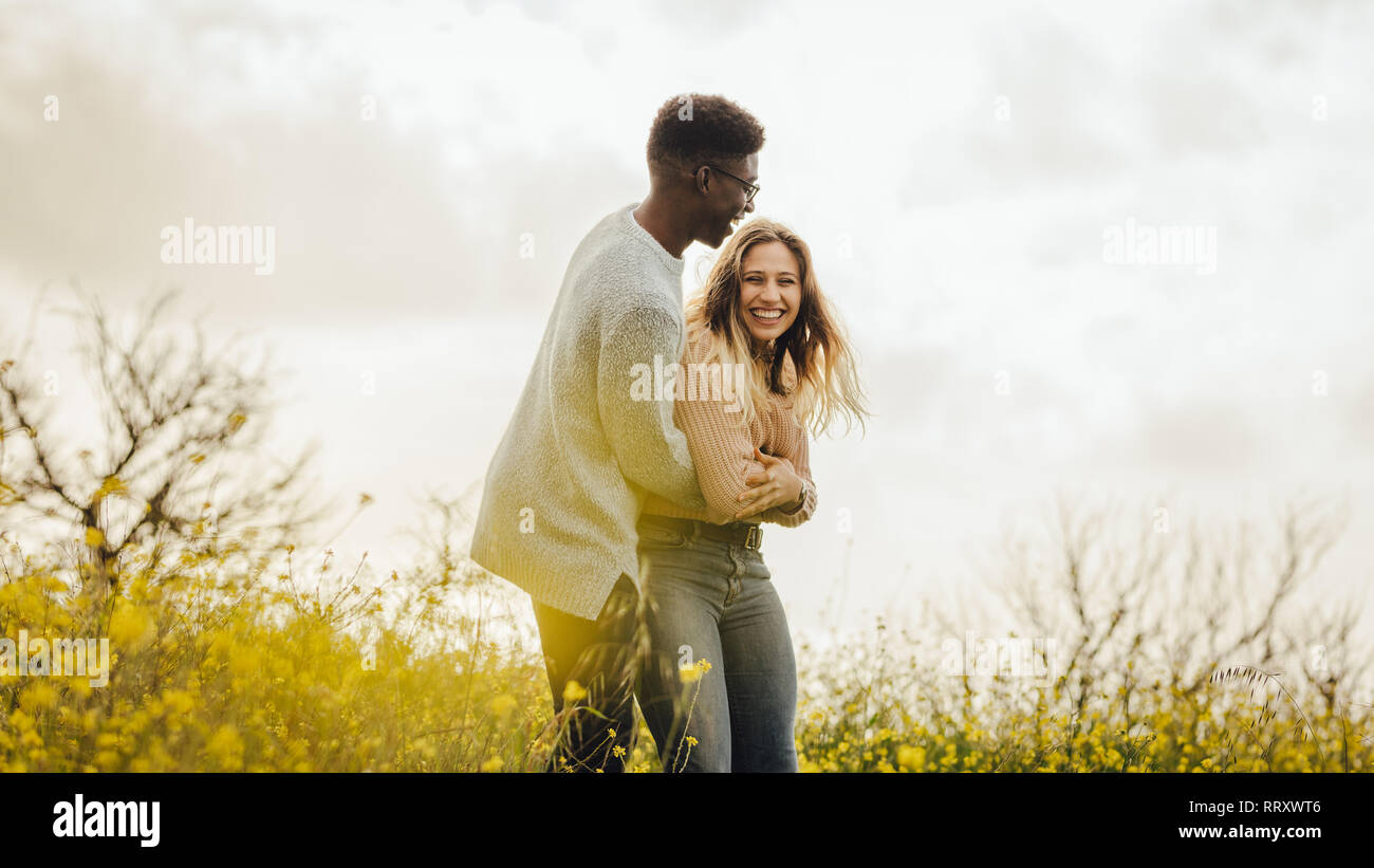 Woman hugging man from back hi-res stock photography and images - Alamy