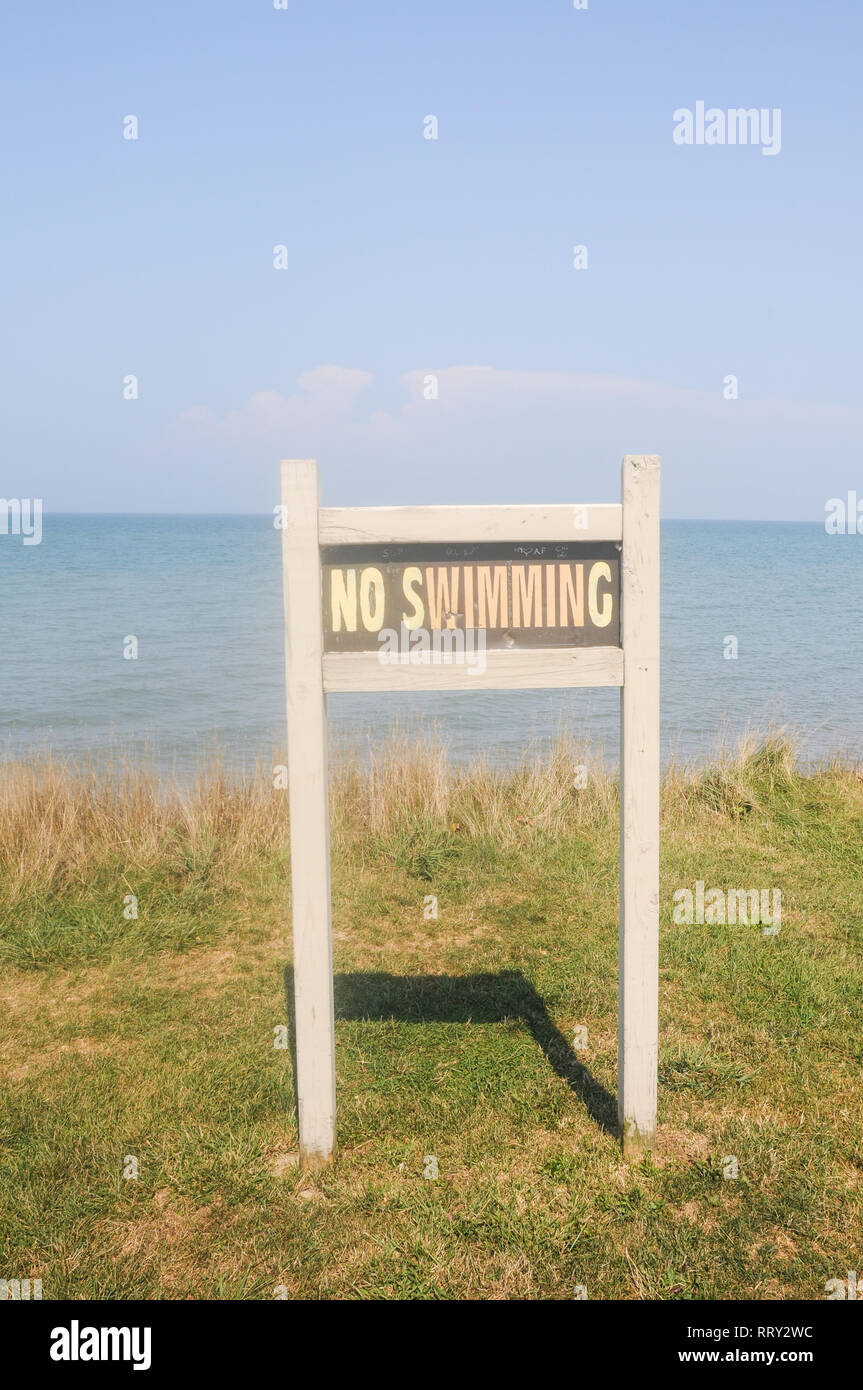 No swimming sign at chimney bluffs state park Stock Photo - Alamy
