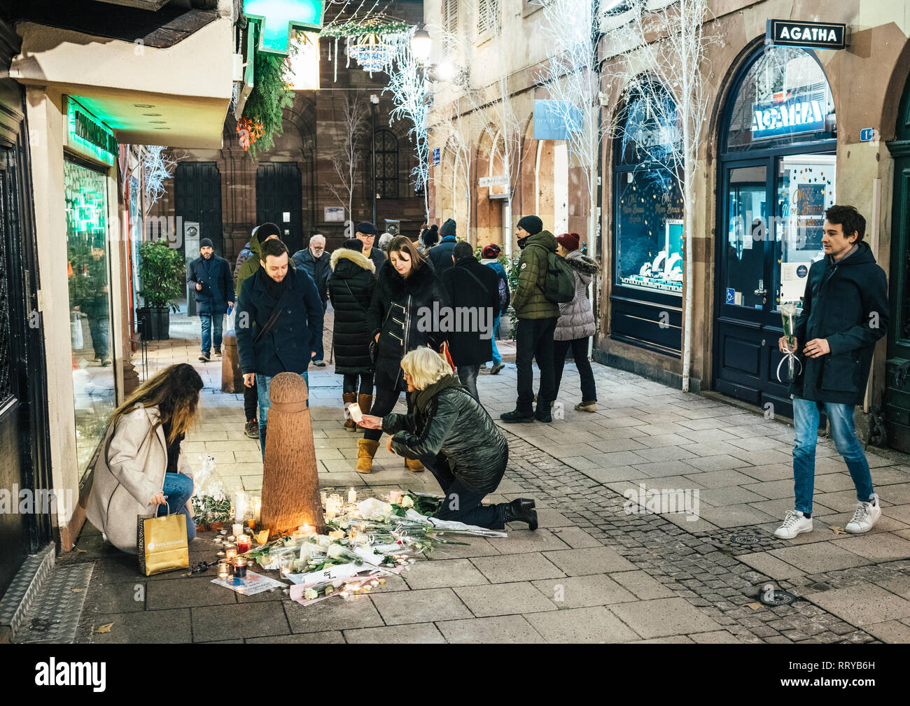 STRASBOURG, FRANCE - DEC 13, 2018: Sad people mourners gathered on Rue ...