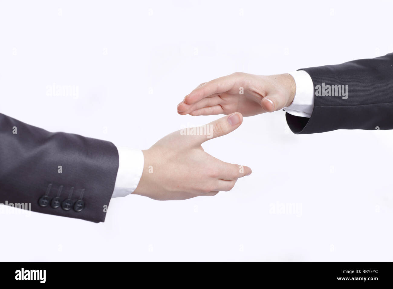 close up.two businessmen holding out their hands for a handshake Stock ...