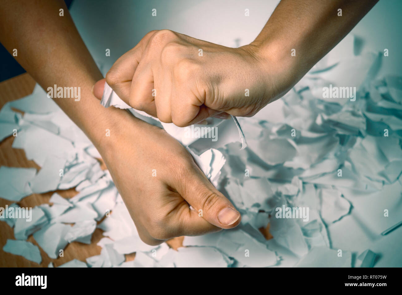 Man ripping up paper hi-res stock photography and images - Alamy