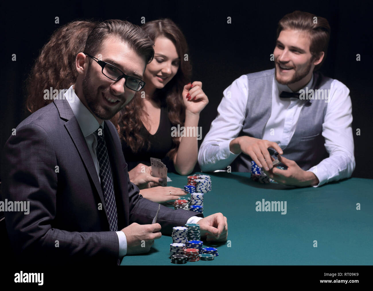 Modern businessman playing poker hi-res stock photography and images ...