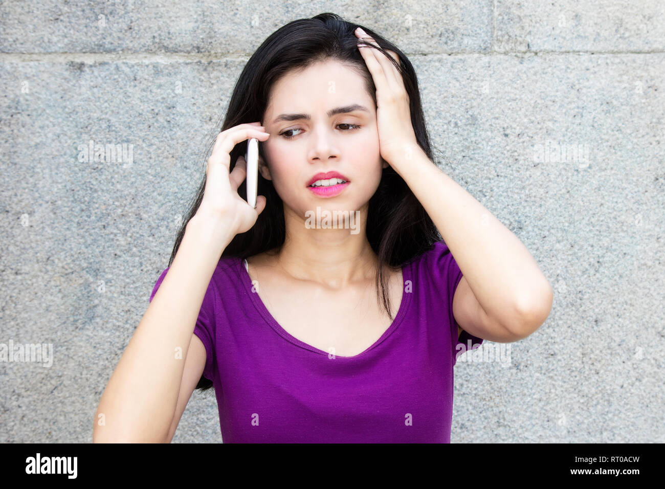 Shocked italian woman receiving bad news outdoors with copy space Stock ...