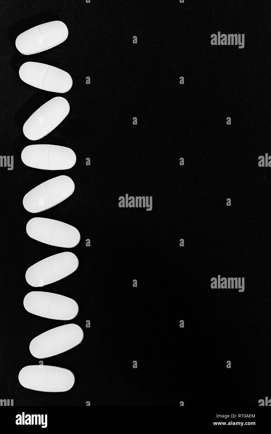 Falling tablets Black and White Stock Photos & Images - Alamy