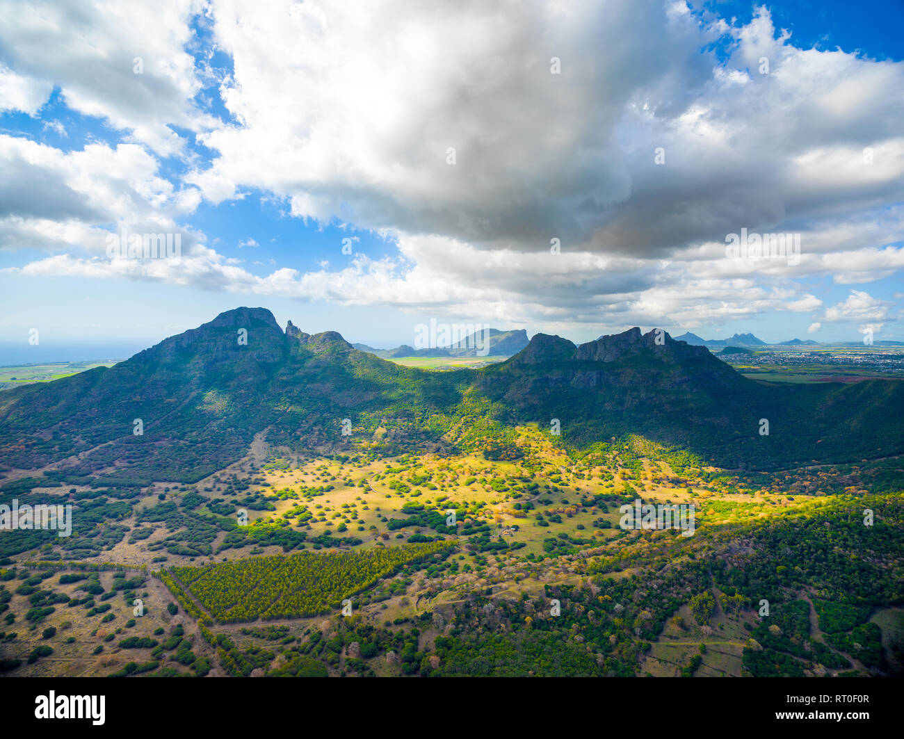 Aerial view of Mauritius island panoramic cloudy landscape with green ...