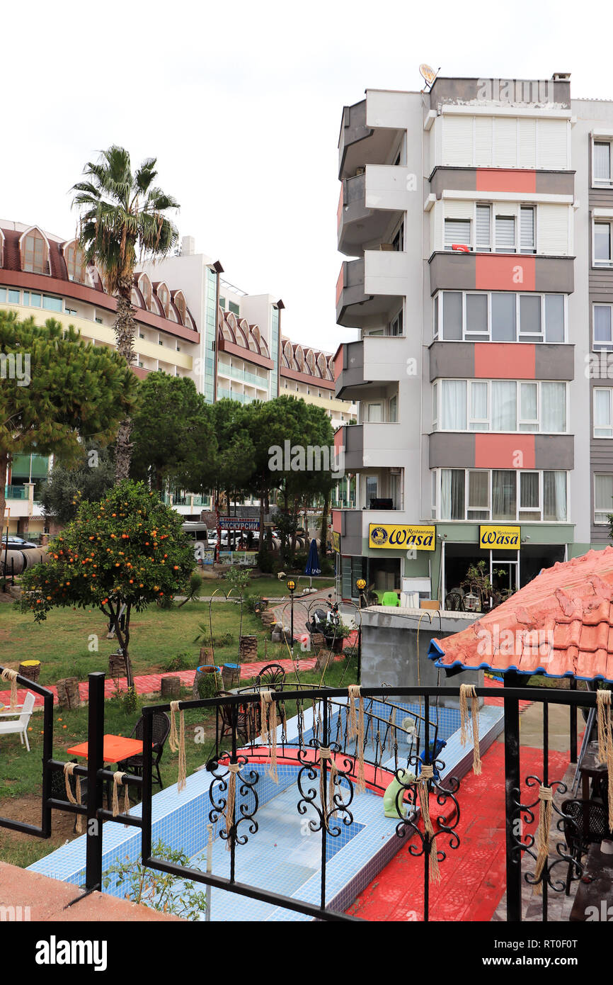 Residential quarter of the city of Alanya. House with a playground ...