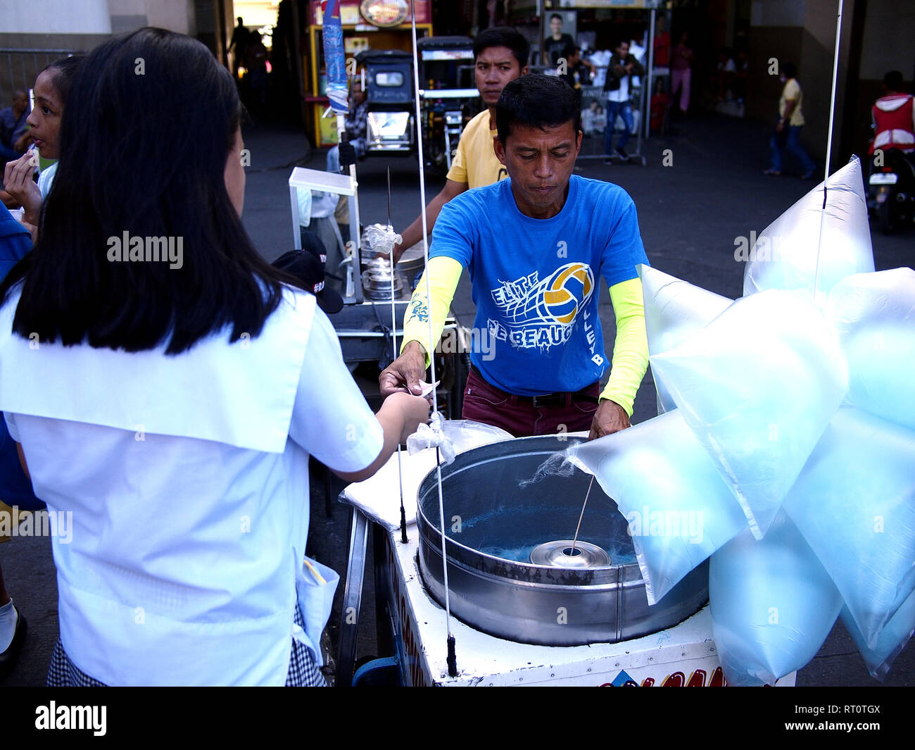 ANTIPOLO CITY, PHILIPPINES - FEBRUARY 21, 2019: A street food vendor ...