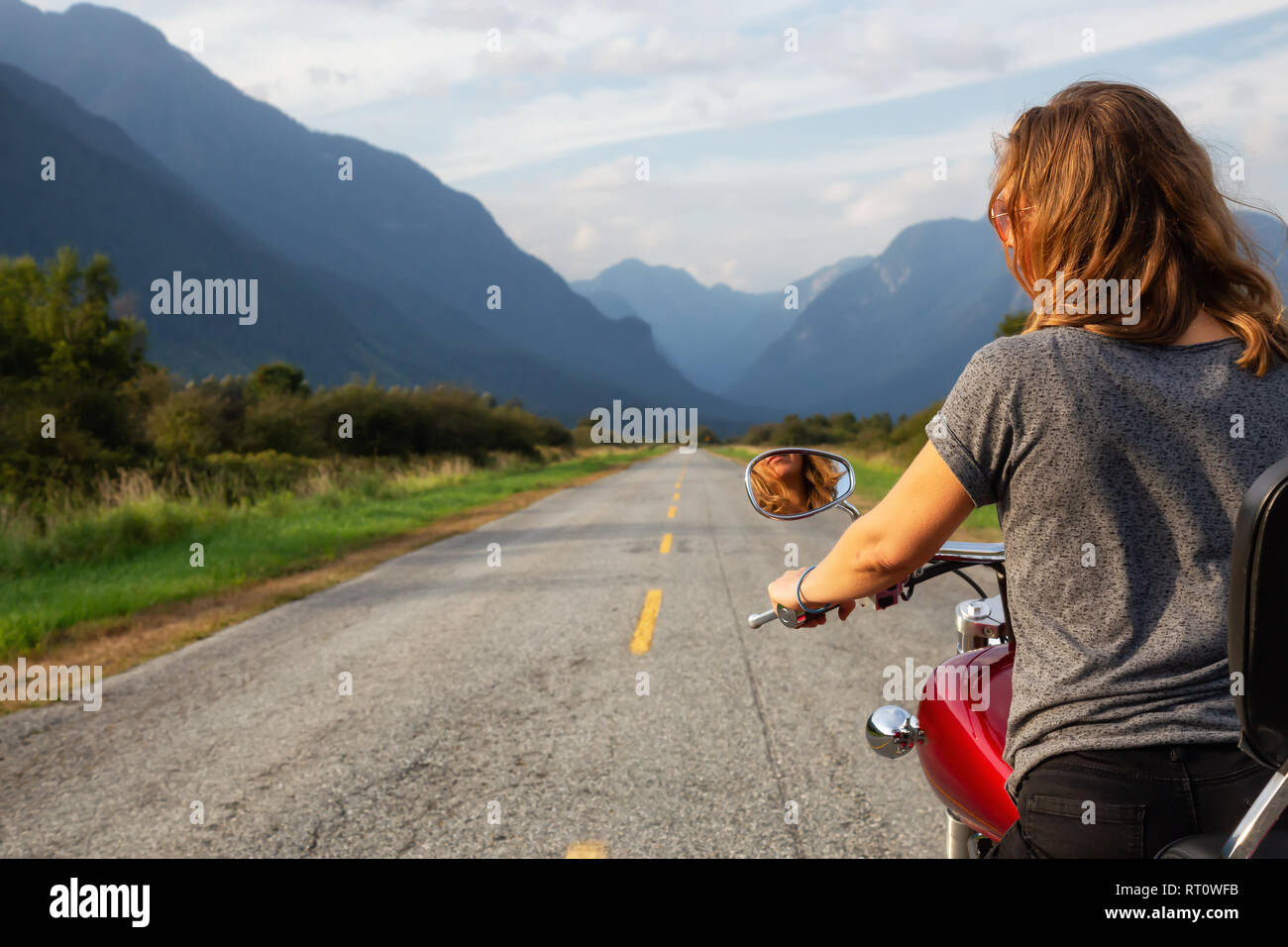 Woman riding a motorcycle hi-res stock photography and images - Alamy