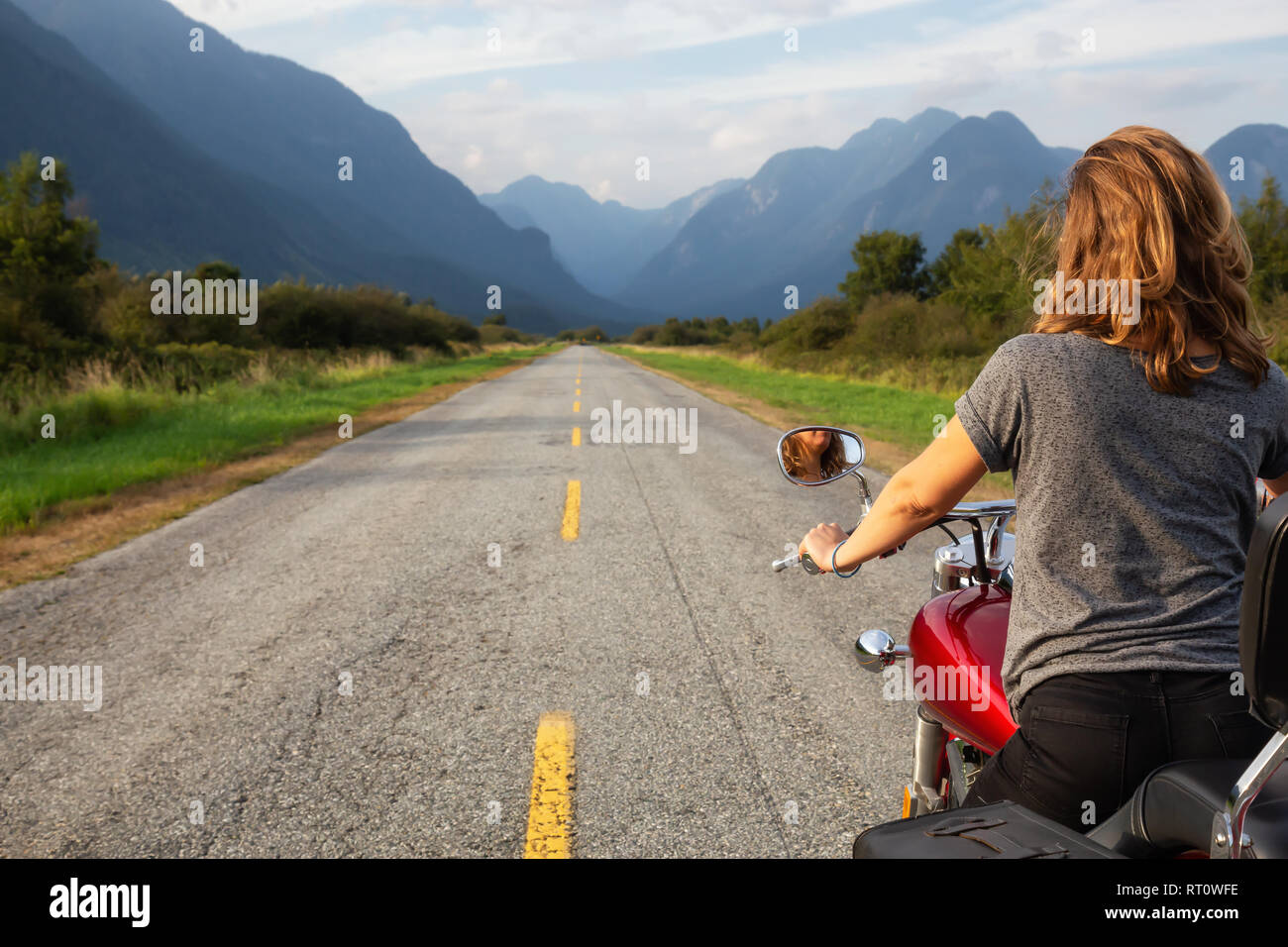 Woman riding a motorcycle hi-res stock photography and images - Alamy