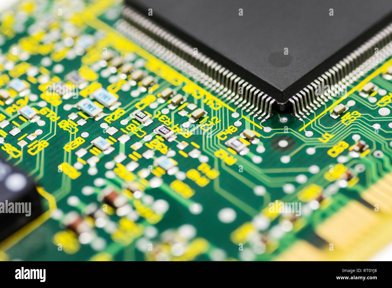 microchips and circuits on a board Stock Photo - Alamy