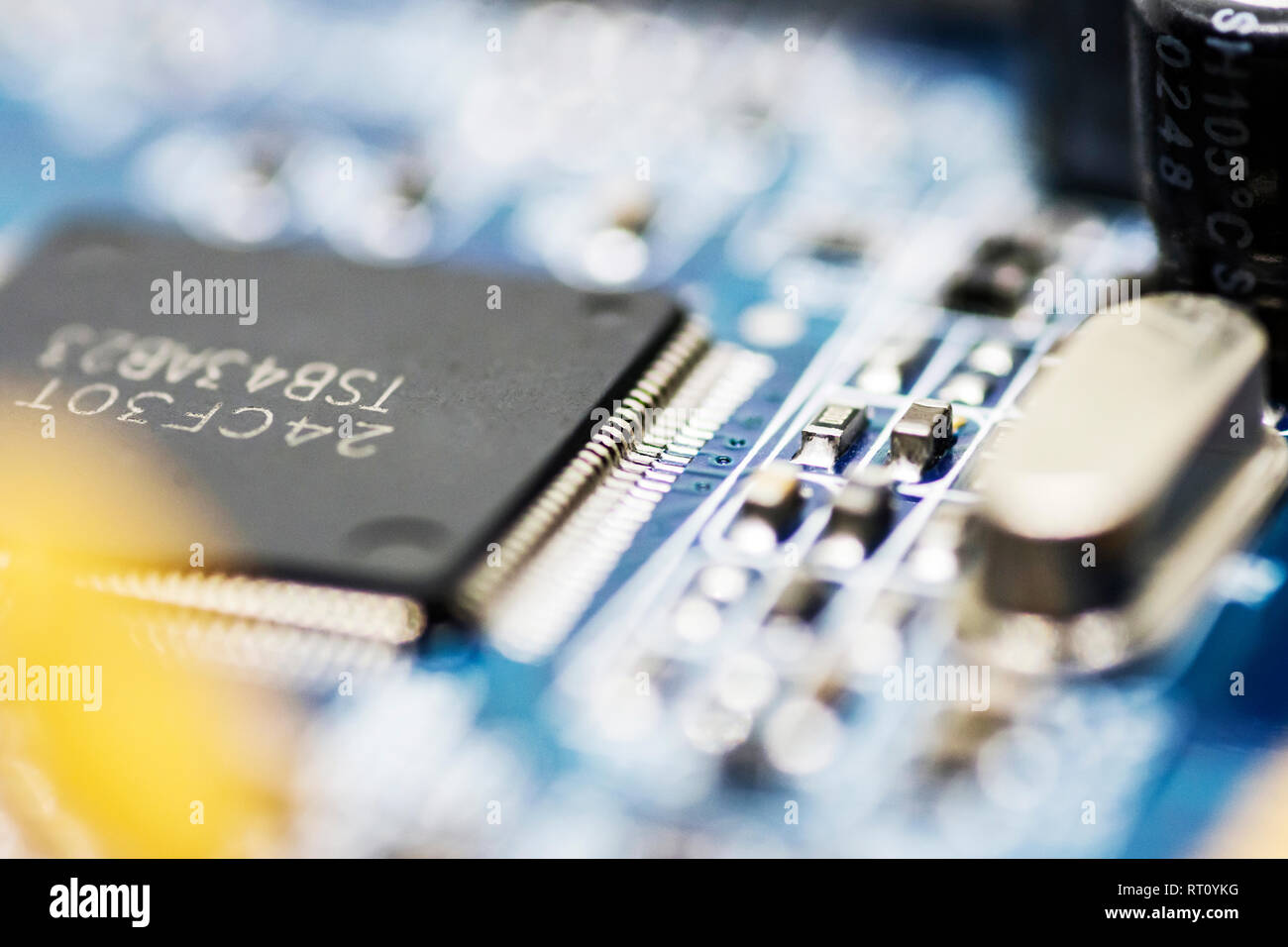 microchips and circuits on a board Stock Photo - Alamy