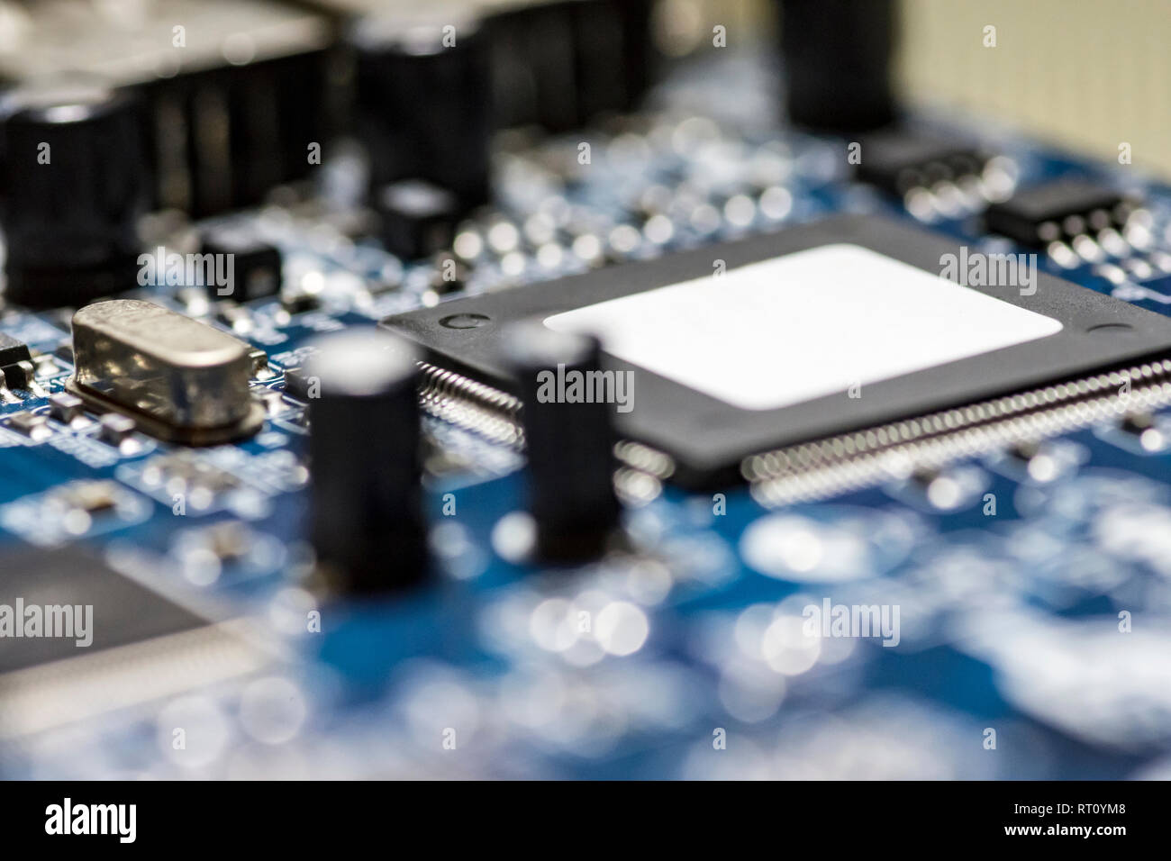 microchips and circuits on a board Stock Photo - Alamy