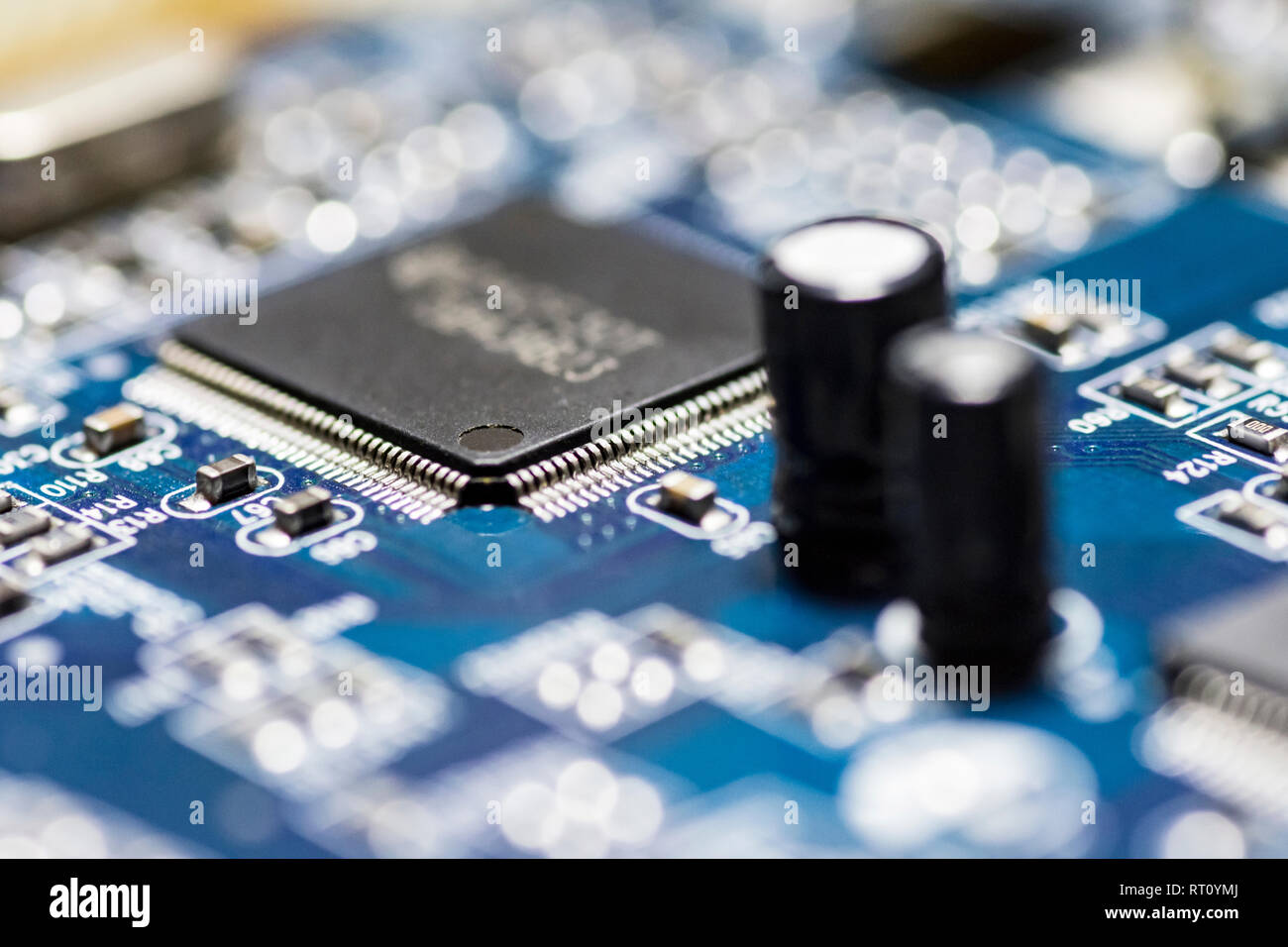 microchips and circuits on a board Stock Photo - Alamy