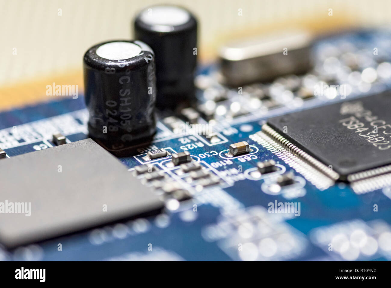 microchips and circuits on a board Stock Photo - Alamy