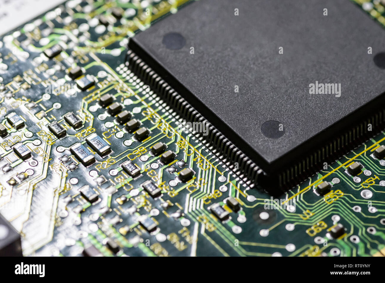 microchips and circuits on a board Stock Photo - Alamy