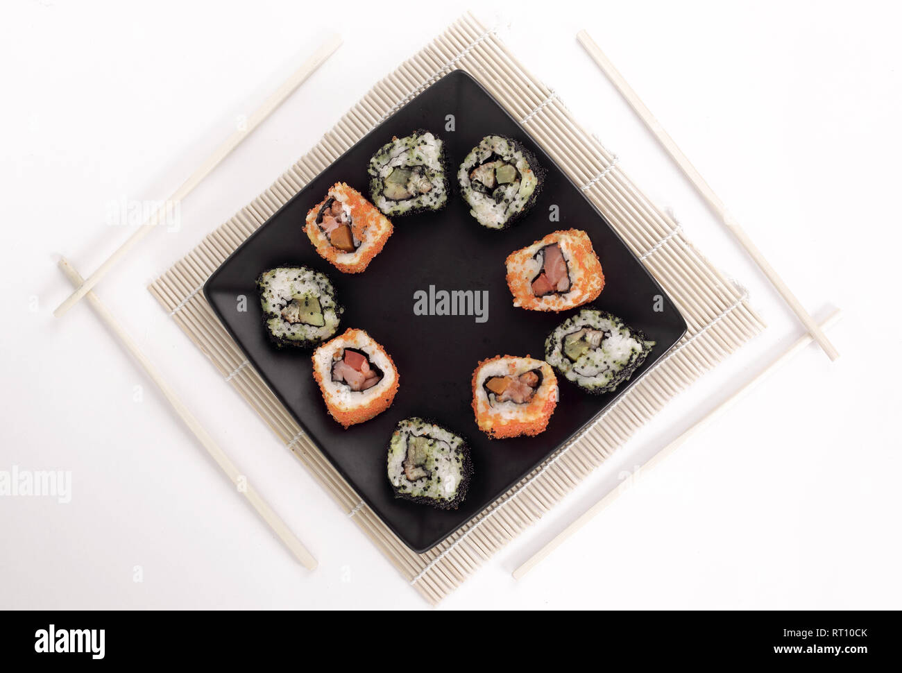different types of Maki sushi on a black plate Stock Photo - Alamy