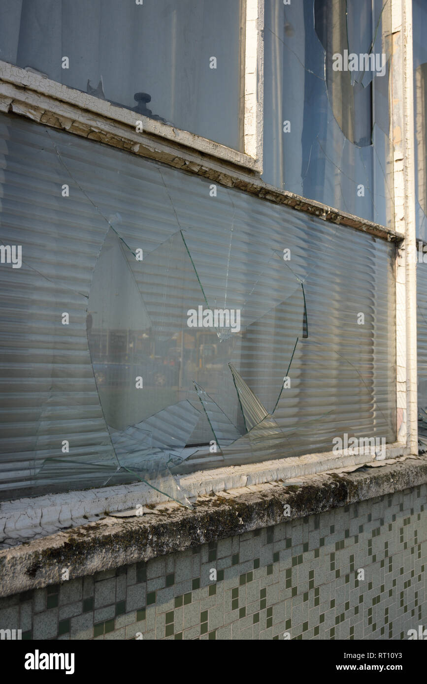 Broken windows in Disused and derelict fire station in bury lancashire ...