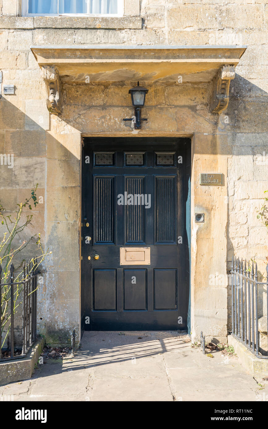Smart wooden front door to house in the pretty Cotswold market town of ...
