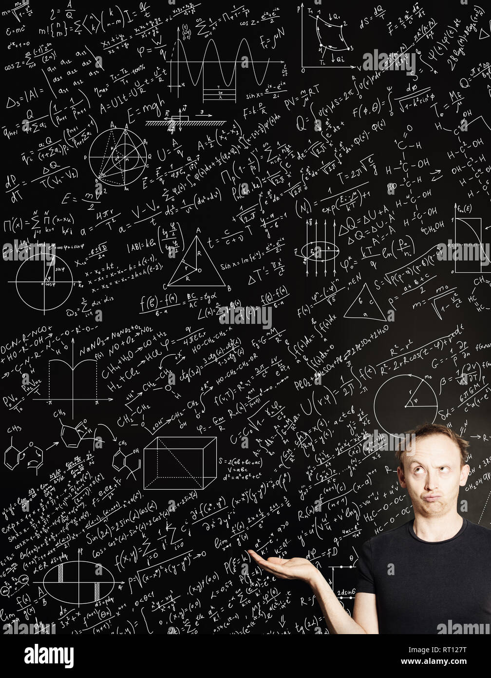 Man on blackboard science background. Education, exam and learning ...