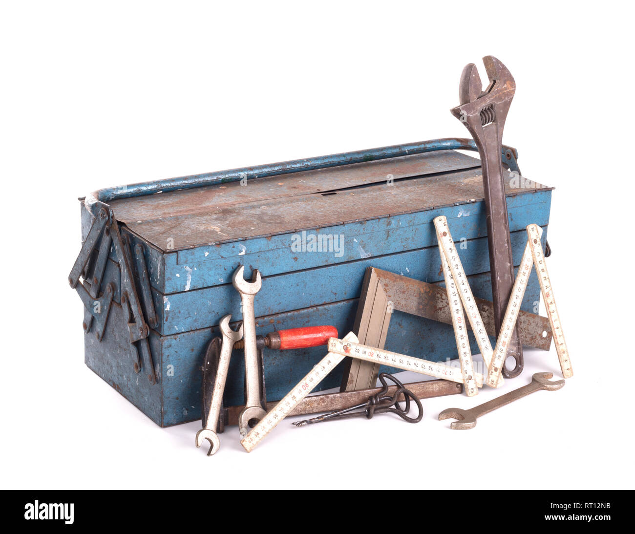 Old toolbox filled with vintage tools, isolated Stock Photo - Alamy
